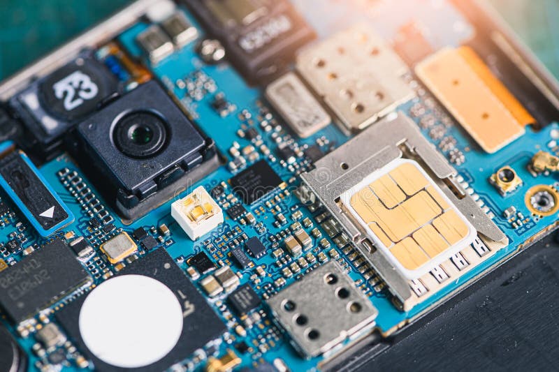 The Inside of the Smartphone`s Motherboard and Tools Lay on the White ...