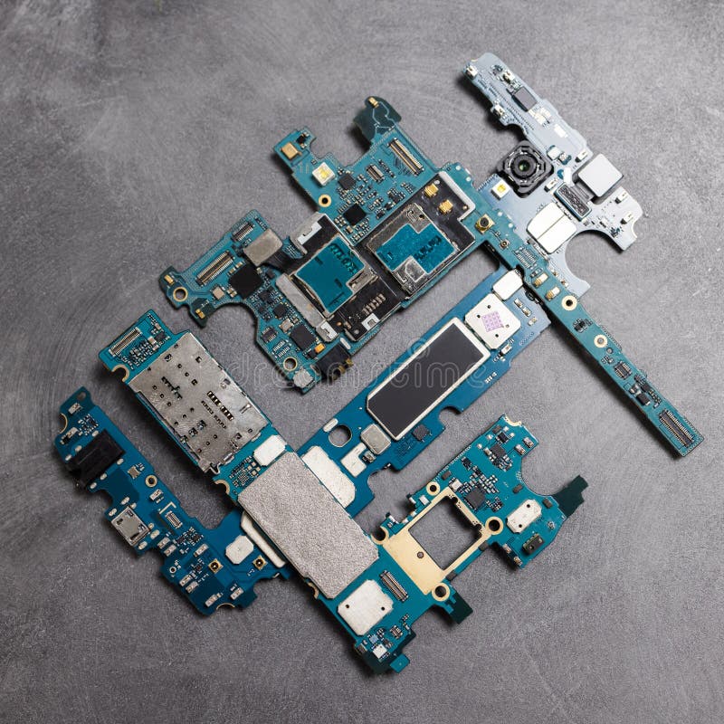 The Inside of the Smartphone S Motherboard and Tools Lay on the Back ...
