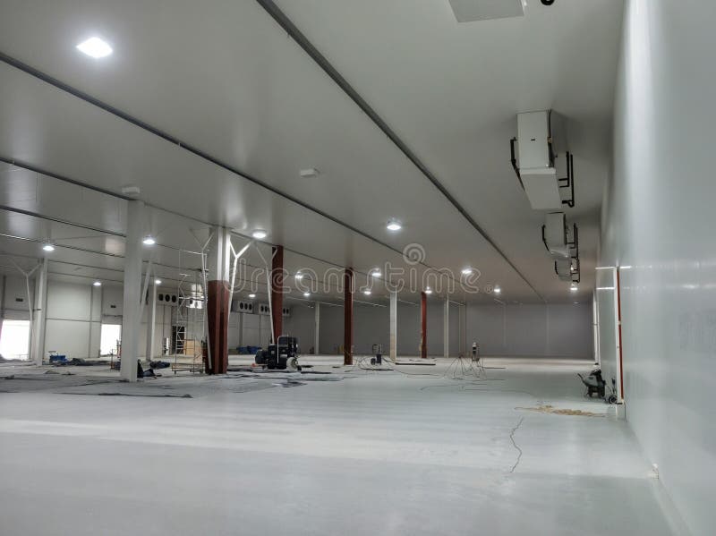 Inside a Spacious, Modern Warehouse with Bright Lighting and a ...