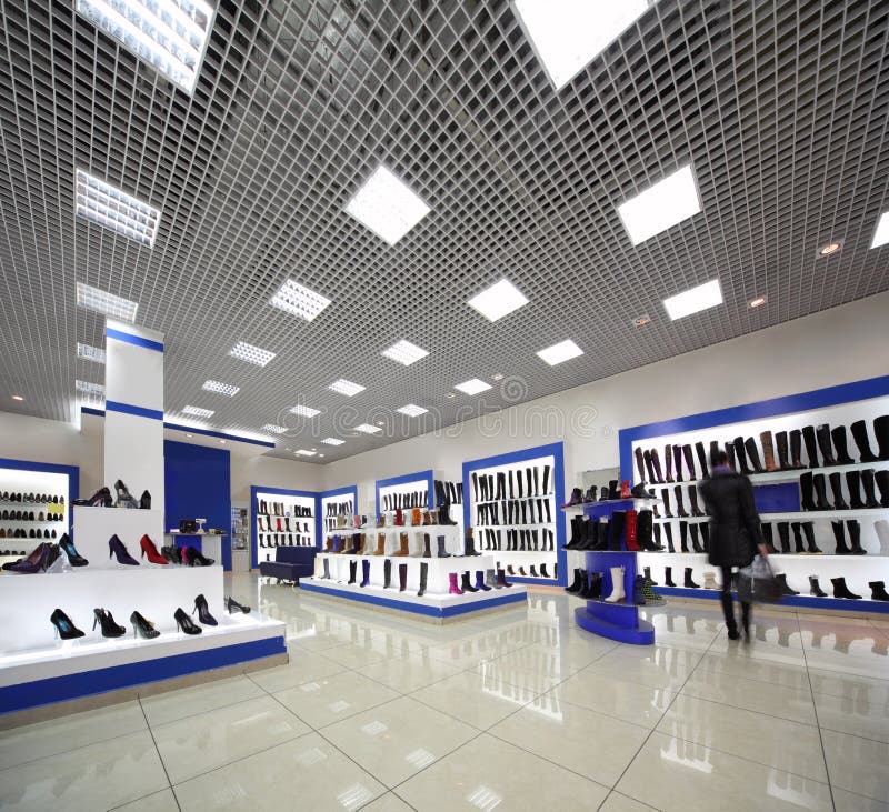 Inside Spacious Shoes Shop with Models on Shelves Stock Image - Image ...