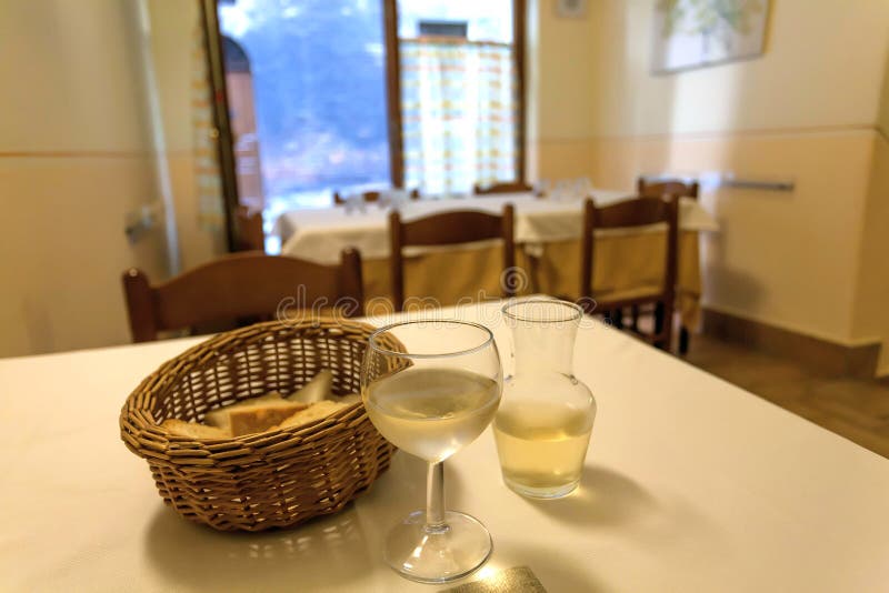 Inside Traditional Italian Trattoria. White Wine on Table of Old ...