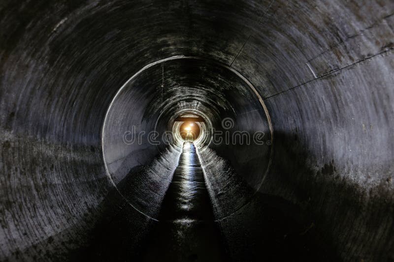 Inside Underground Urban Sewer System. Sewage Flowing in Round Sewer ...
