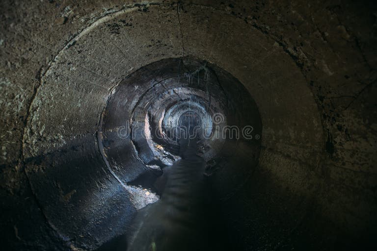 Inside Underground Urban Sewer System. Sewage Flowing in Round Sewer ...