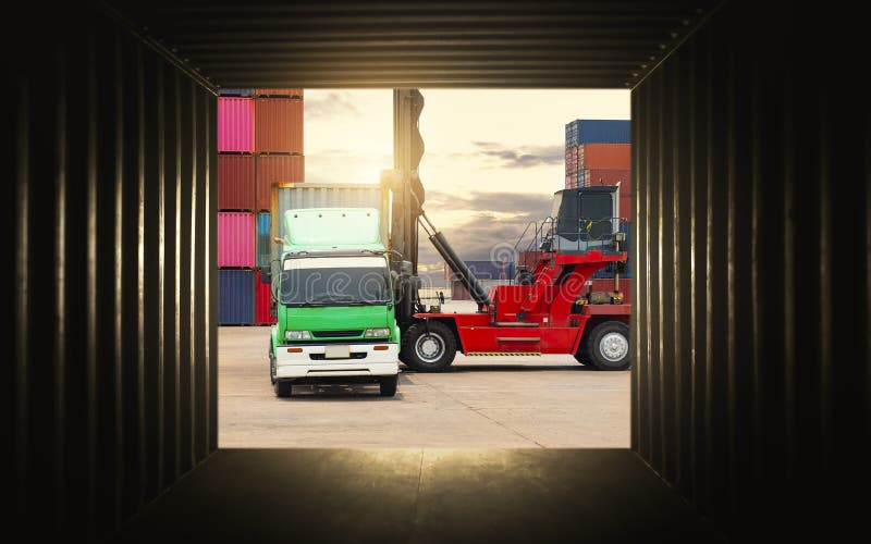 Container Crane Tractor Lifting Up Stacking Cargo Container. Handling ...