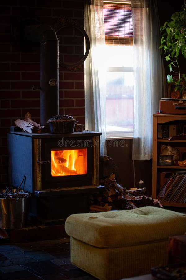 Inside View of a Cozy Living Room with a Fireplace Wood Stove Stock ...