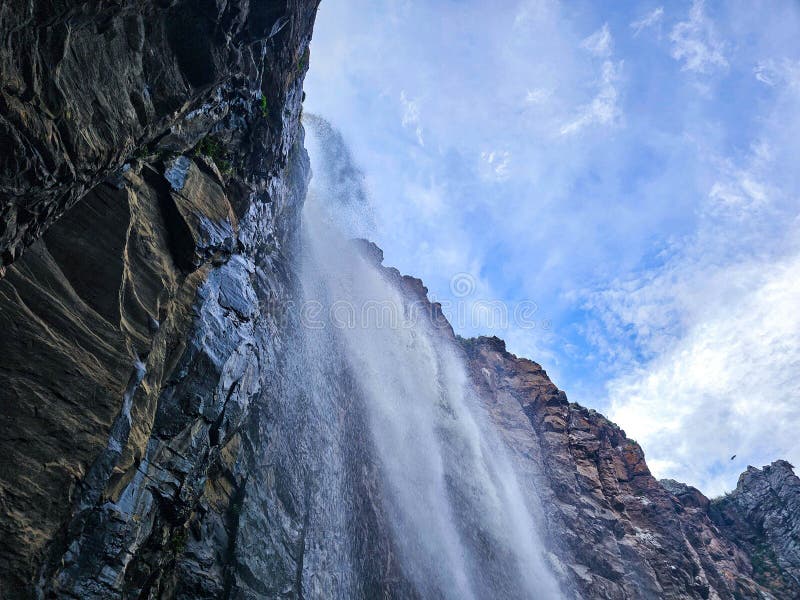 Inside View of Falls with Stone Cliffs and Blue Sky Stock Image - Image ...