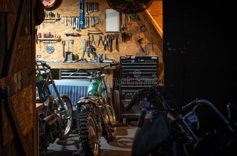 Inside View of a Garage with Motorcycles and Instruments on the Wall ...