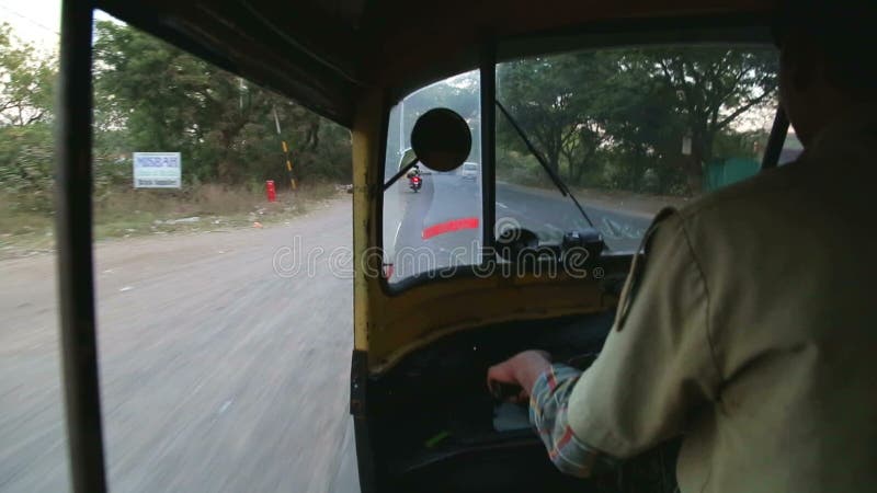 Inside View on Man Driving Rickshaw through the Road in Mumbai. Stock ...
