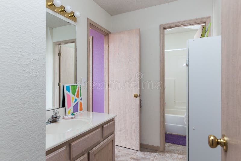 Inside View of a Modern Bathroom with White Walls, Sink, Mirror, and ...