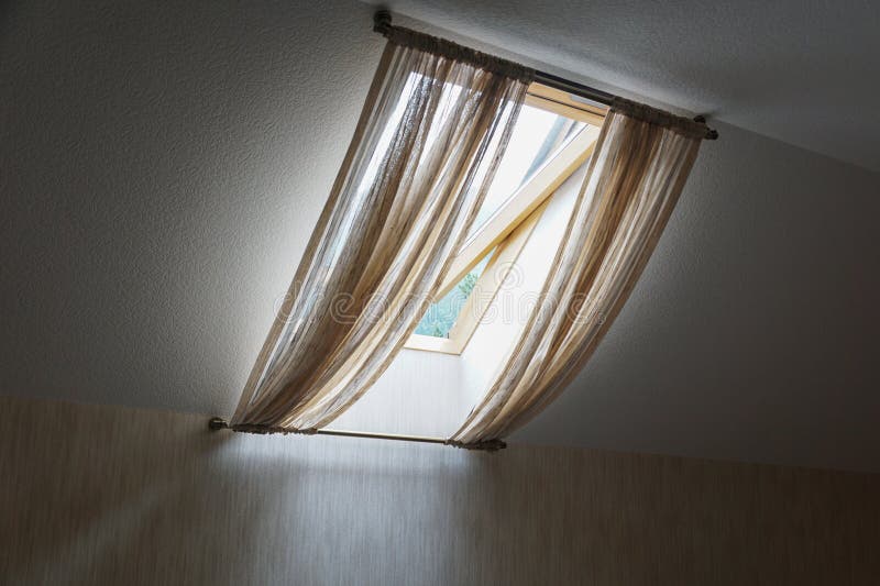 Inside View of Opened Rooftop Window Covered with Curtains. Stock Image ...