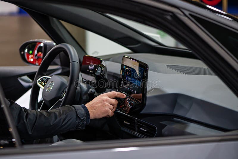 Inside View of the Volkswagen VW ID4 Electric Car, Driver Setting Up ...