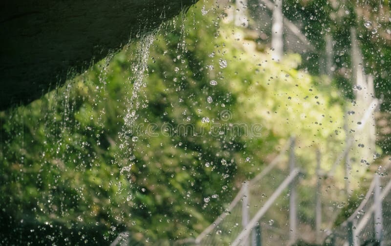 Inside View of a Waterfall with Trees in the Background. Stock Image ...