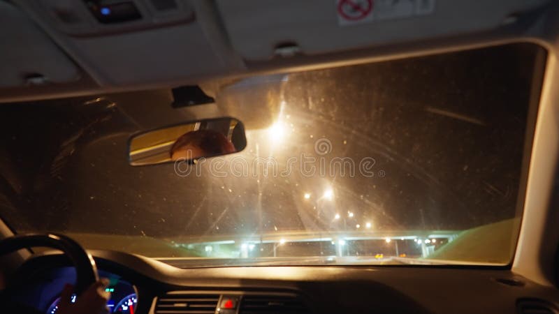 Inside View of the Windshield of a Car that is Driving Along the ...