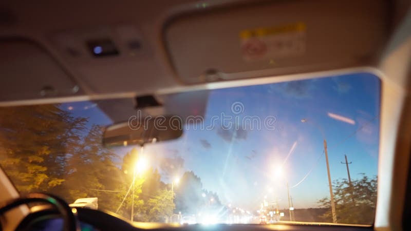 Inside View of the Windshield of a Car that is Driving Along the ...