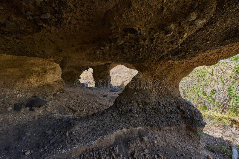 Inside Volcanic Cave with Multiple Openings Stock Photo - Image of ...