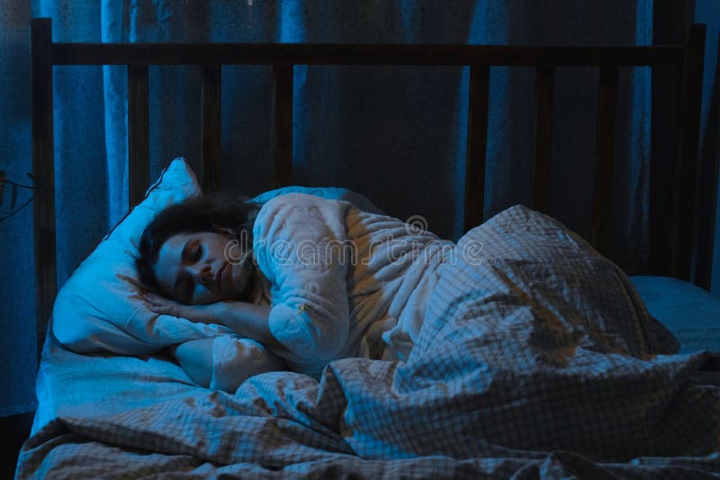 Insomnia. Woman Lying Awake in Bed at Night. Stock Photo - Image of ...
