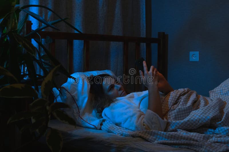 Insomnia. Woman Lying Awake in Bed at Night. Stock Photo - Image of ...