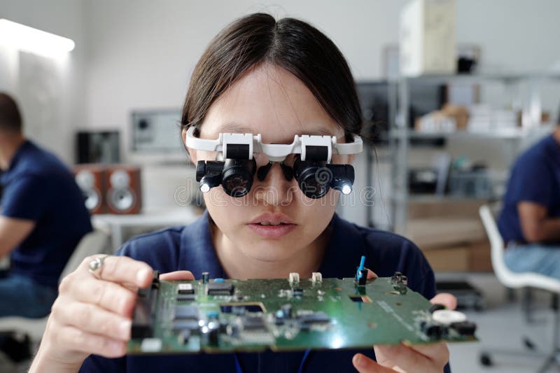 Inspecting Circuit Board with Advanced Magnifying Glasses Stock Photo ...