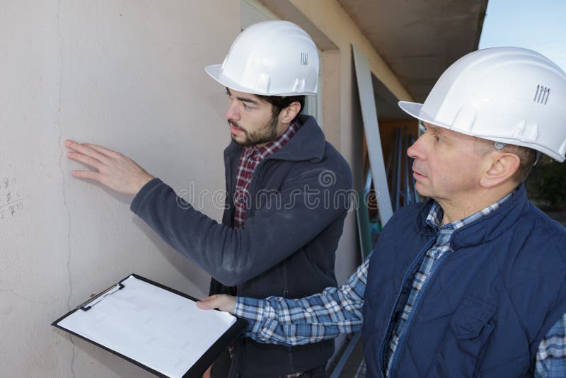 Inspecting the Wall Condition Stock Photo - Image of builder, cost ...