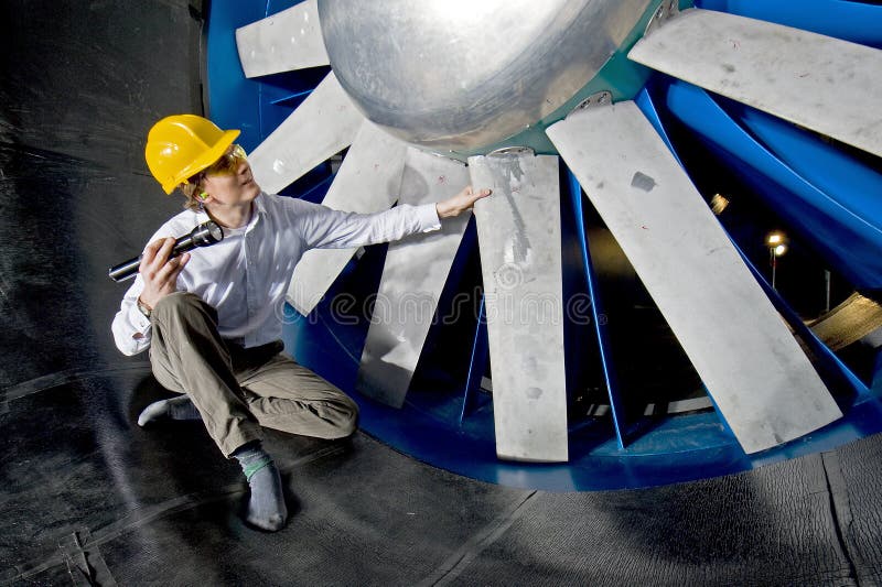 Inspecting a windtunnel stock image. Image of male, aerodynamics - 5030569