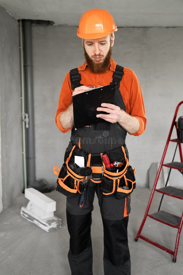 Inspection and Engineering Concept. Builder Inspector in Safety Hardhat ...