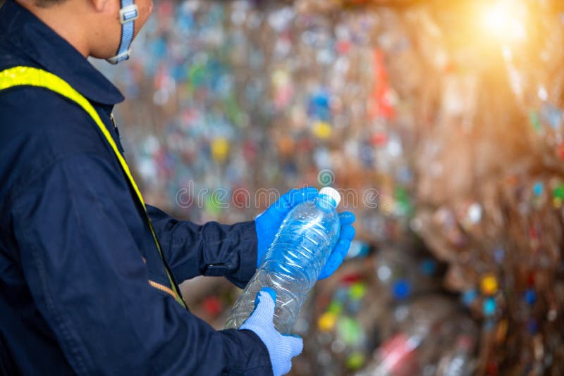 Inspection of Waste Plastic Water Bottles Stock Photo - Image of blur ...