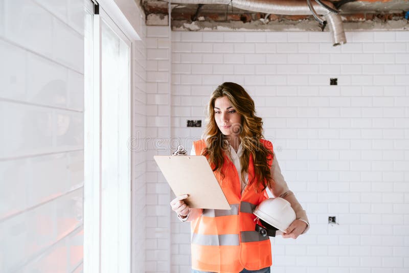 Inspector or Architect Professional Woman Checking Kitchen at ...