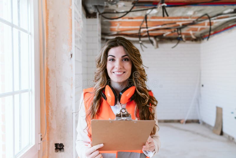 Inspector or Architect Professional Woman Checking Kitchen at ...