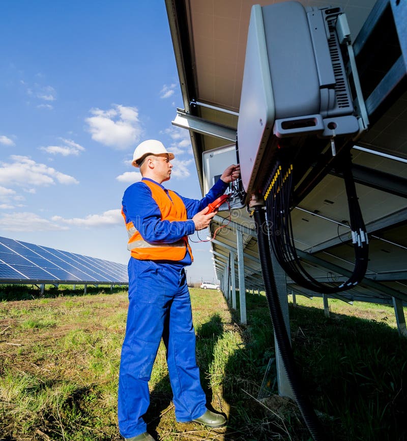 The Inspector Checks the Actual Output Voltage Level of Inverter Stock ...