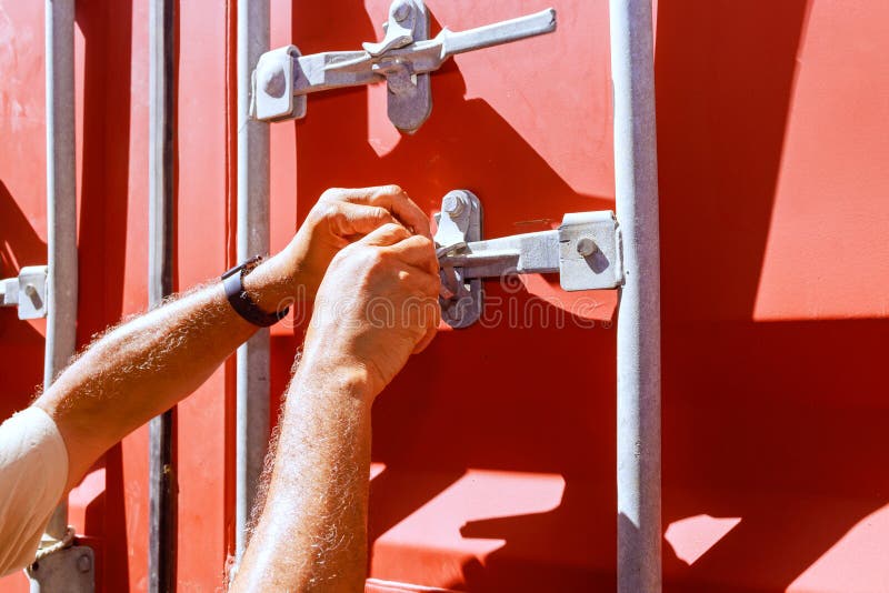 An Inspector from Customs Department Seals a Ready Container for Export ...