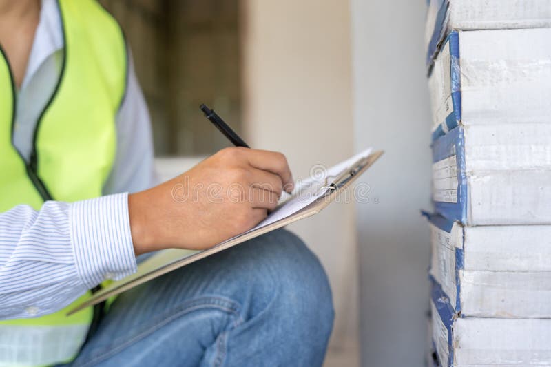 Inspector or Engineer is Inspecting Construction House Using a ...