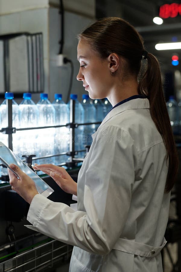 Inspector Examining Plastic Packaging Stock Photo - Image of adult ...