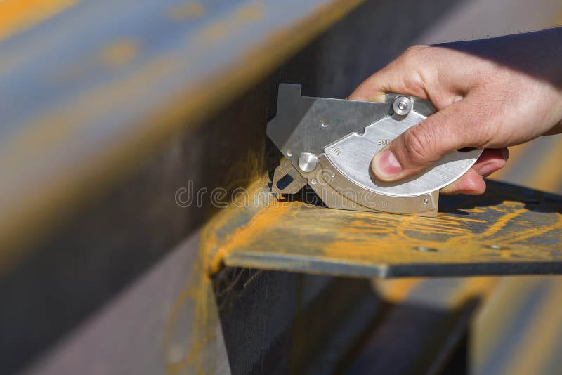 The Inspector is Measuring To Fillet Weld Thickness with Welding ...