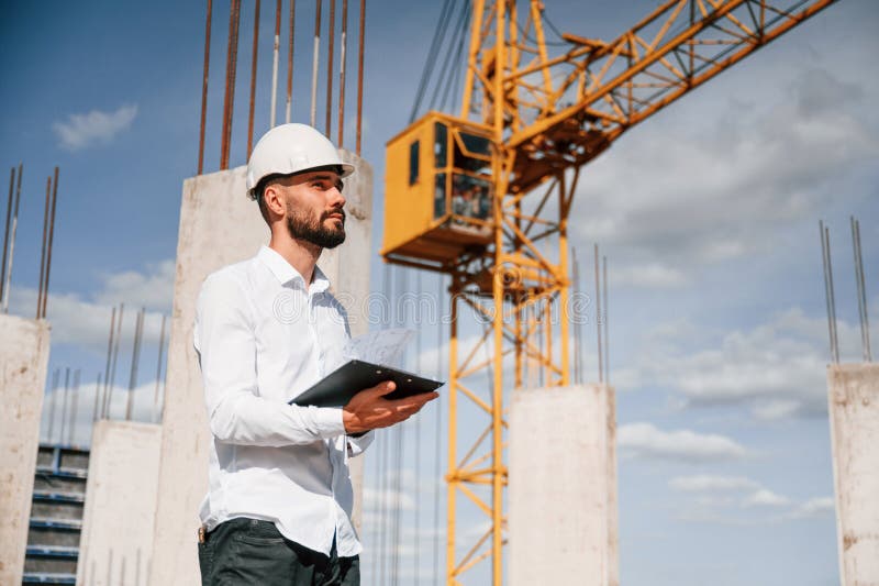 Inspector with Notepad is Standing on the Construction Site Stock Image ...