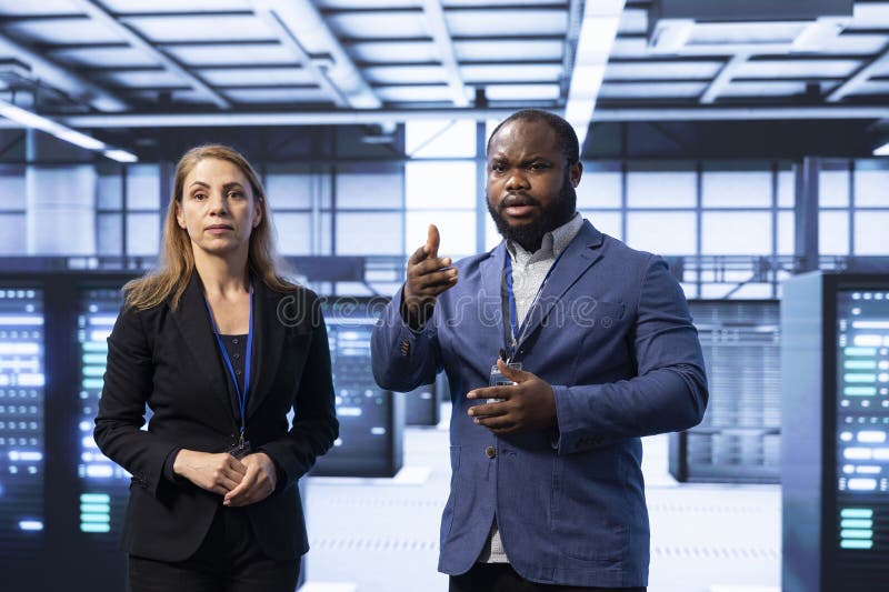 Inspector Overseeing Data Center, Checking Disaster Recovery Planning ...