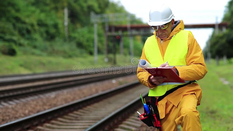 Inspector of Railway Traffic Makes Notes in His Documents Stock Video ...