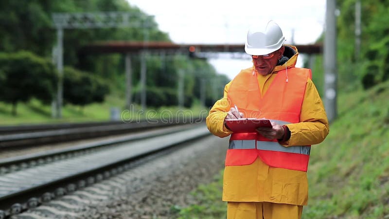 Inspector of Railway Traffic Makes Notes in His Documents Stock Video ...