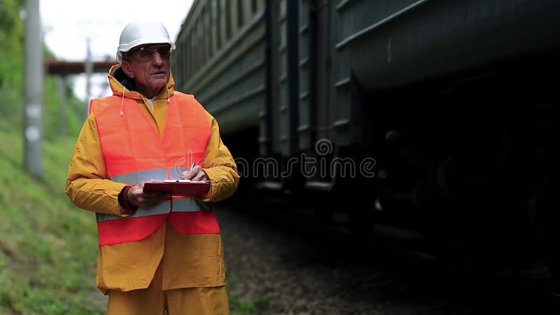 Inspector of Railway Traffic Makes Notes in His Documents Stock Video ...
