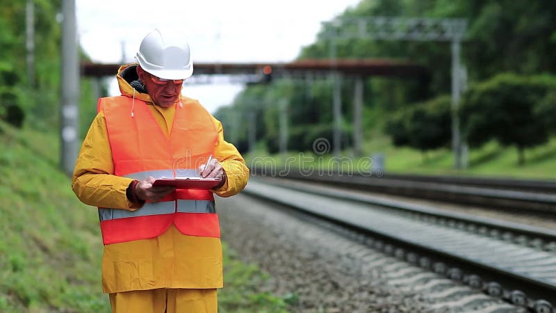 Inspector of Railway Traffic Makes Notes in His Documents Stock Video ...