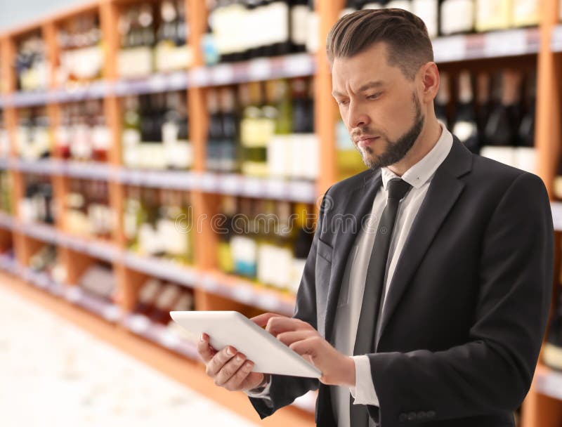 Inspector with Tablet in Supermarket. Quality Control Stock Photo ...