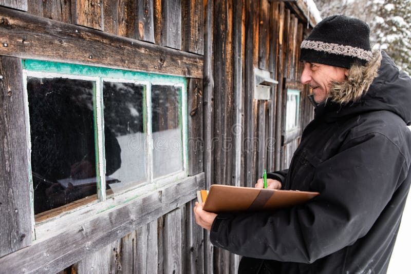 An Inspector at Work Outdoor in Canada Stock Photo - Image of housing ...