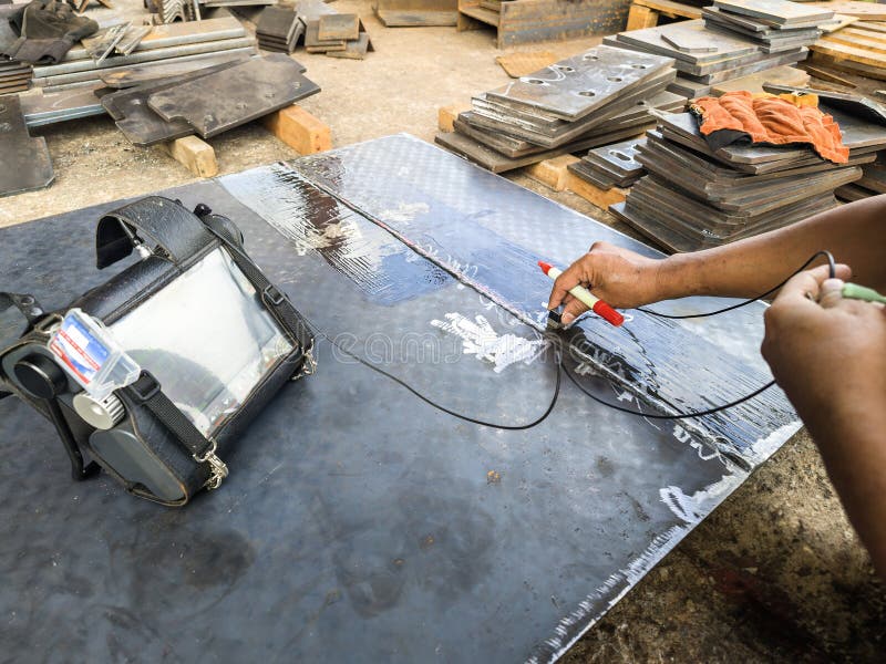 Inspectors are Checking Defects in Welded Steel Plate Add Joints with ...
