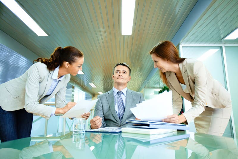 Boss and secretaries stock image. Image of employee, paper - 32048359