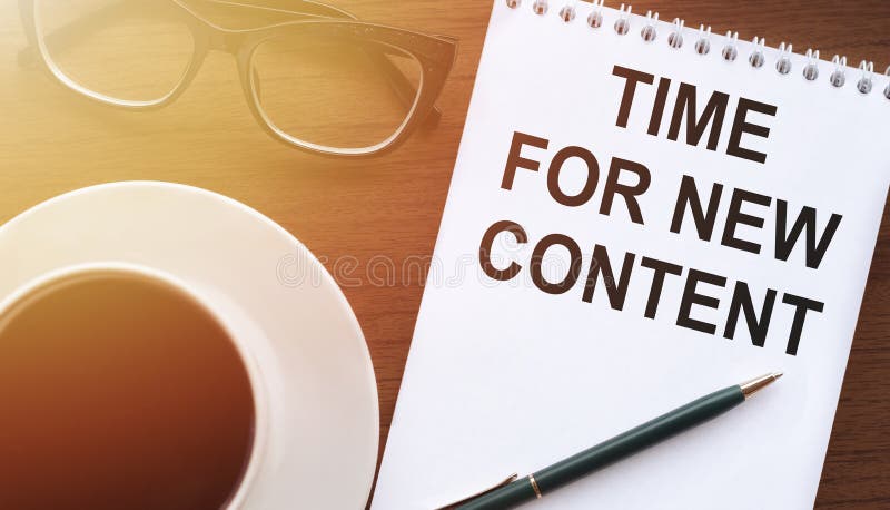 Inspirational Quote Text on Notepad - Time for New Content, on Table ...