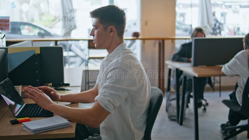 Inspired Man Texting Computer at Workplace Closeup. Programmer Closed ...