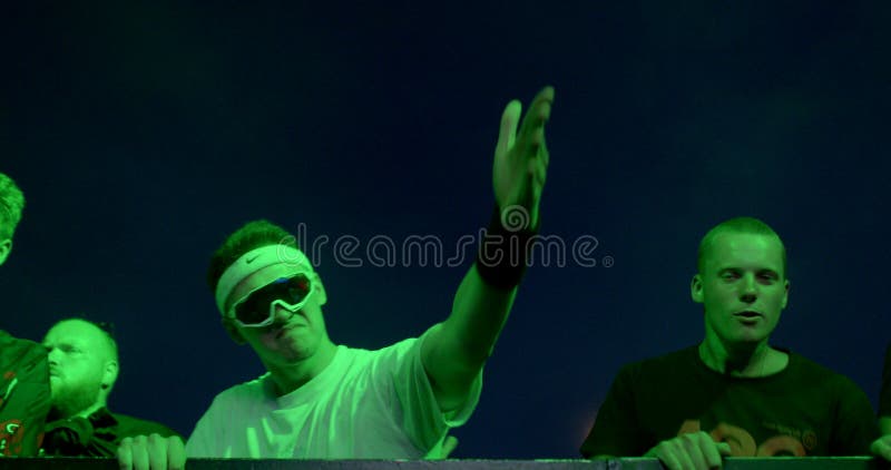 Inspired People Dance. they Move Their Hands. Using Glasses Against the ...