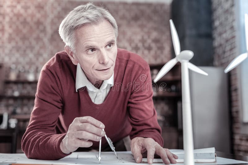 Focused Male Engineer Evaluating His Work Stock Photo - Image of ...
