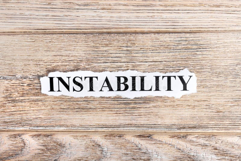 INSTABILITY Text on Paper. Word INSTABILITY on Torn Paper Stock Photo ...