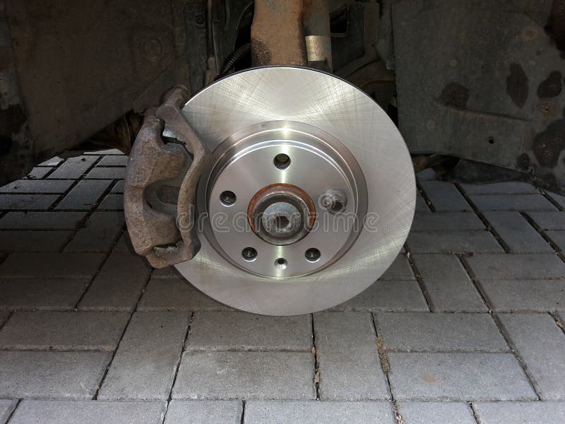 Install a New Brake Disc on the Front Axle Stock Image - Image of ...