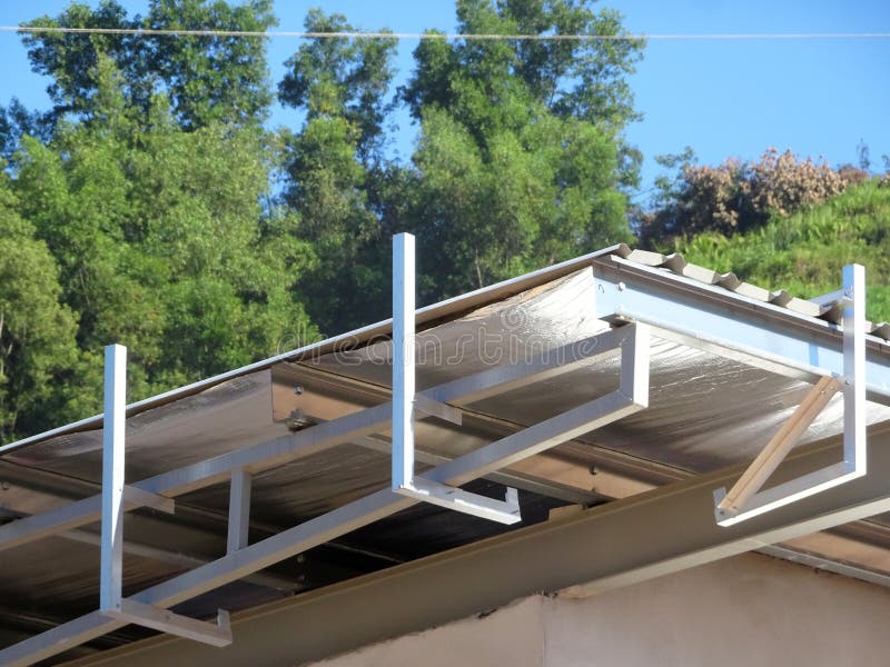 Installation of the Aluminum Cladding Frame at the End of the Roof is ...